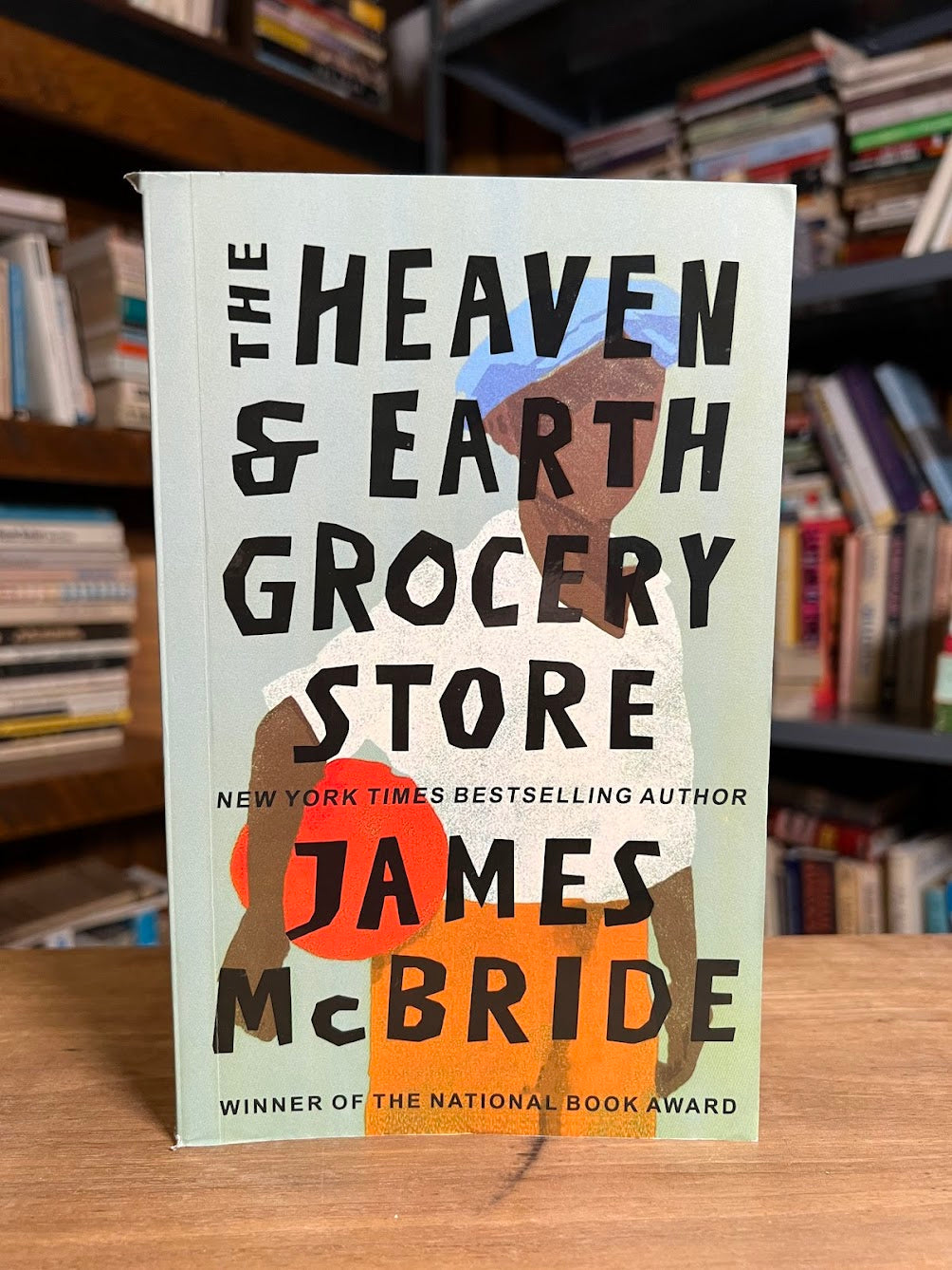 The Heaven and Earth Grocery Store by James McBride – Revolving Books